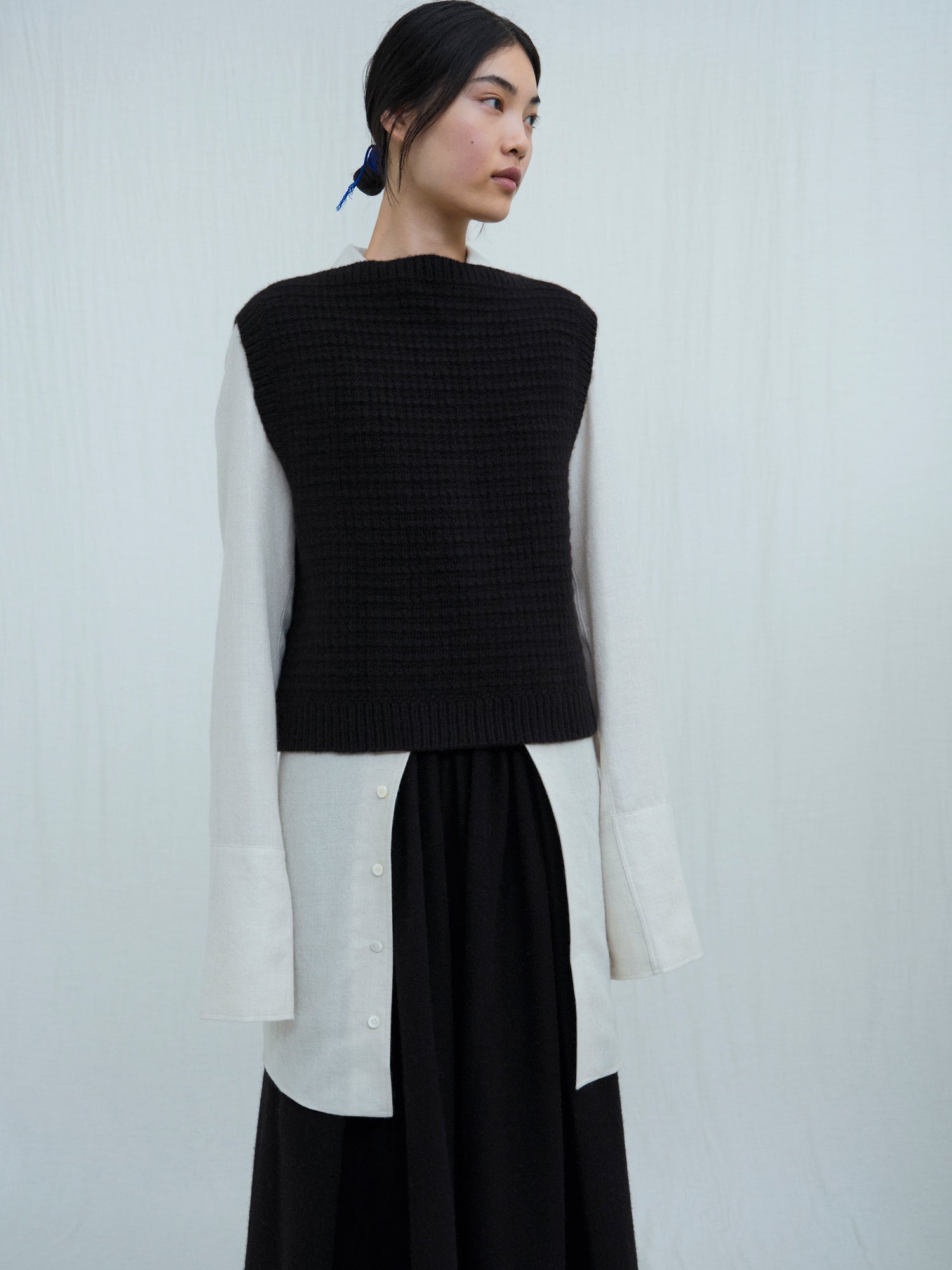 Knitted Tabard Jumper. Hand knitted yak wool jumper from Norlha Atelier