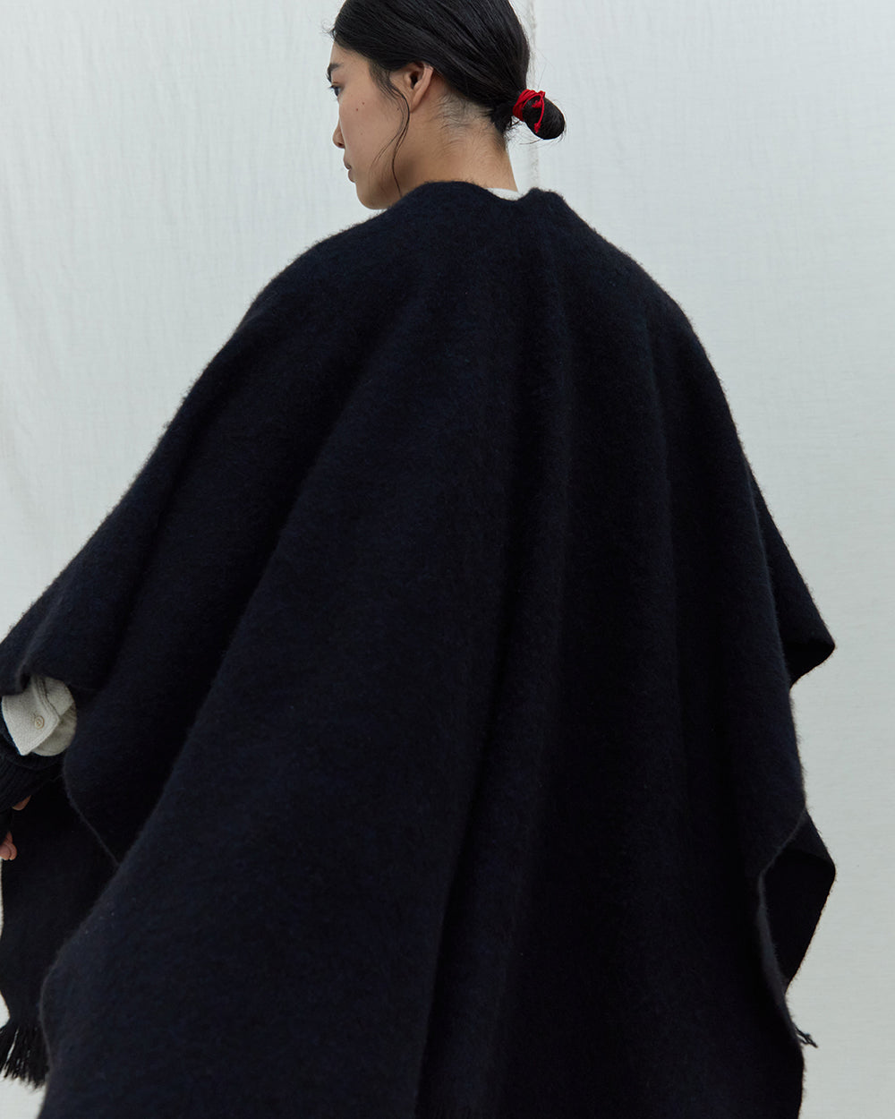 Split Cape. Luxury yak wool capes and ponchos from Norlha Atelier